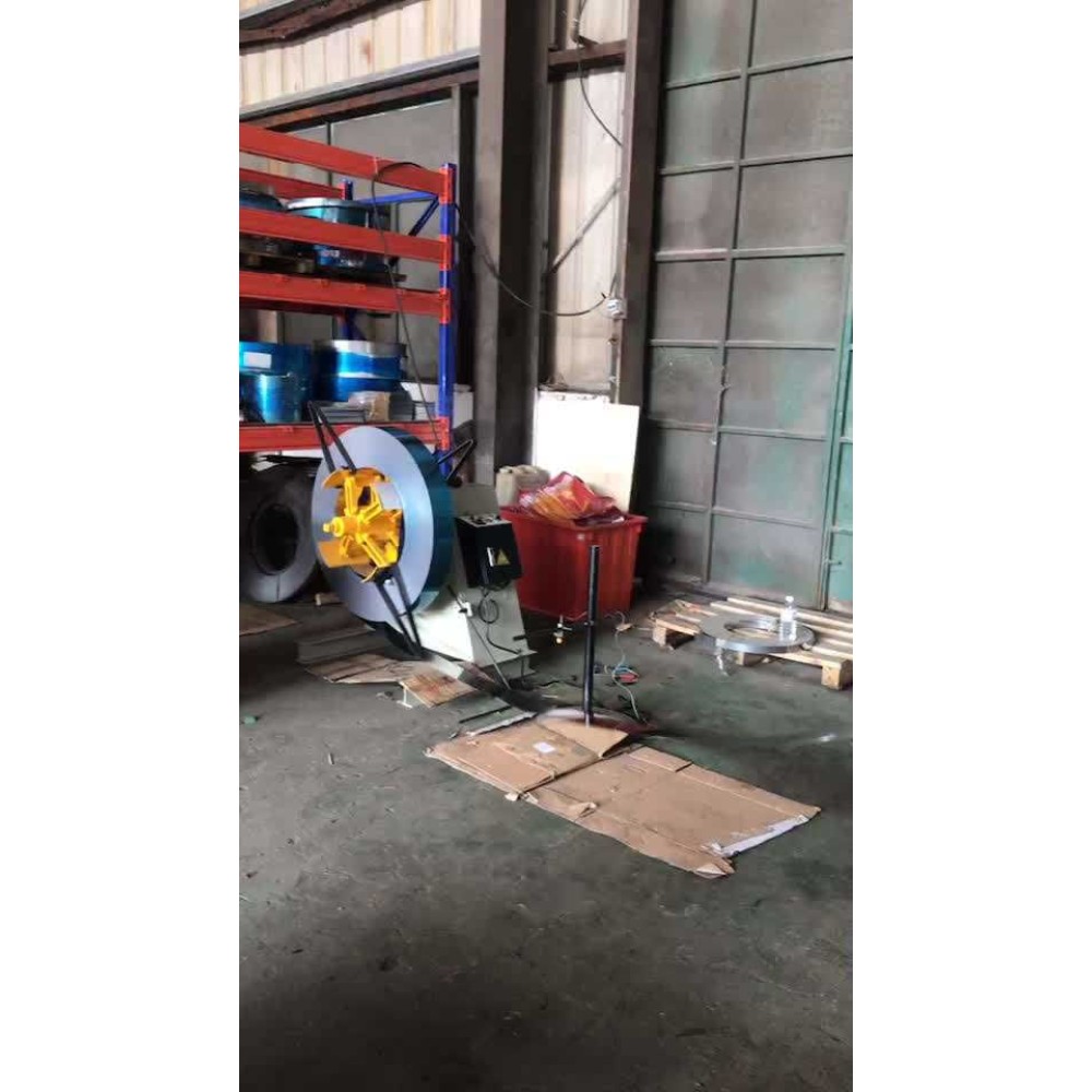 Automatic metal strip coil roller sheet feeder for power press